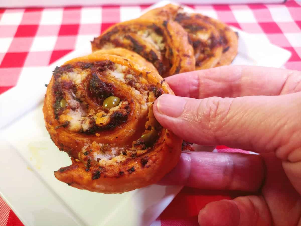 vegan savory puff pastry snails with poppy-parmesan and pizza