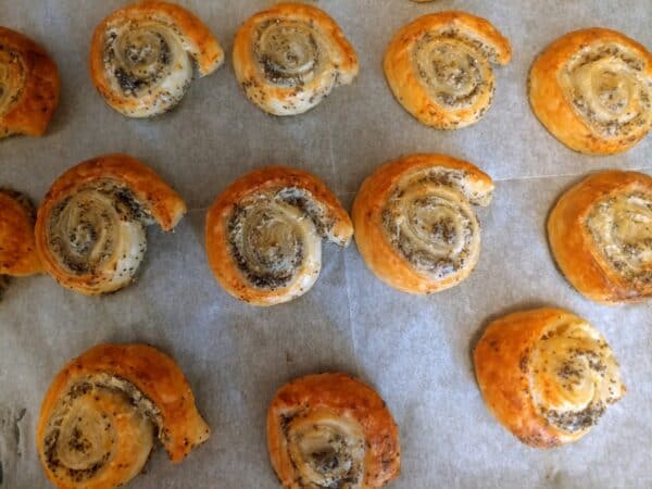 vegan savory puff pastry snails with poppy-parmesan and pizza