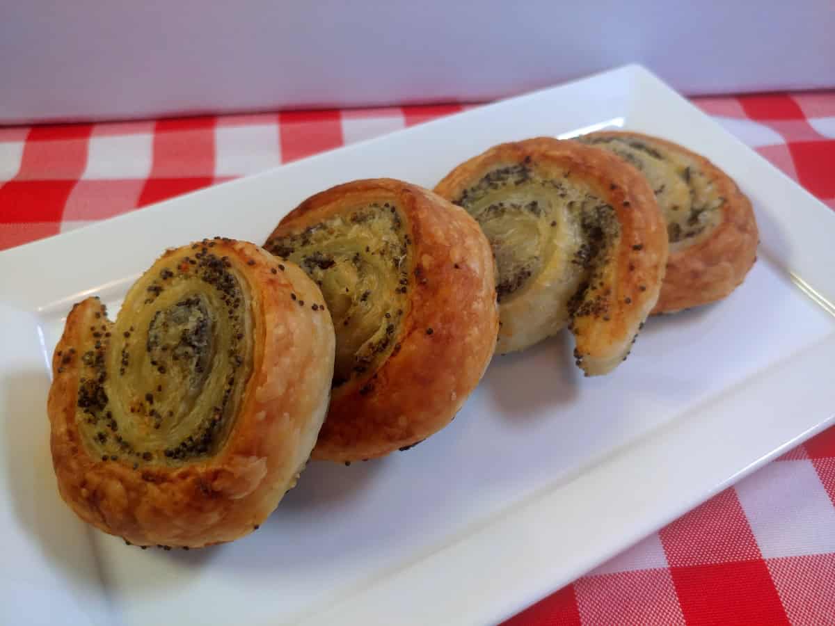vegan savory puff pastry snails with poppy-parmesan and pizza