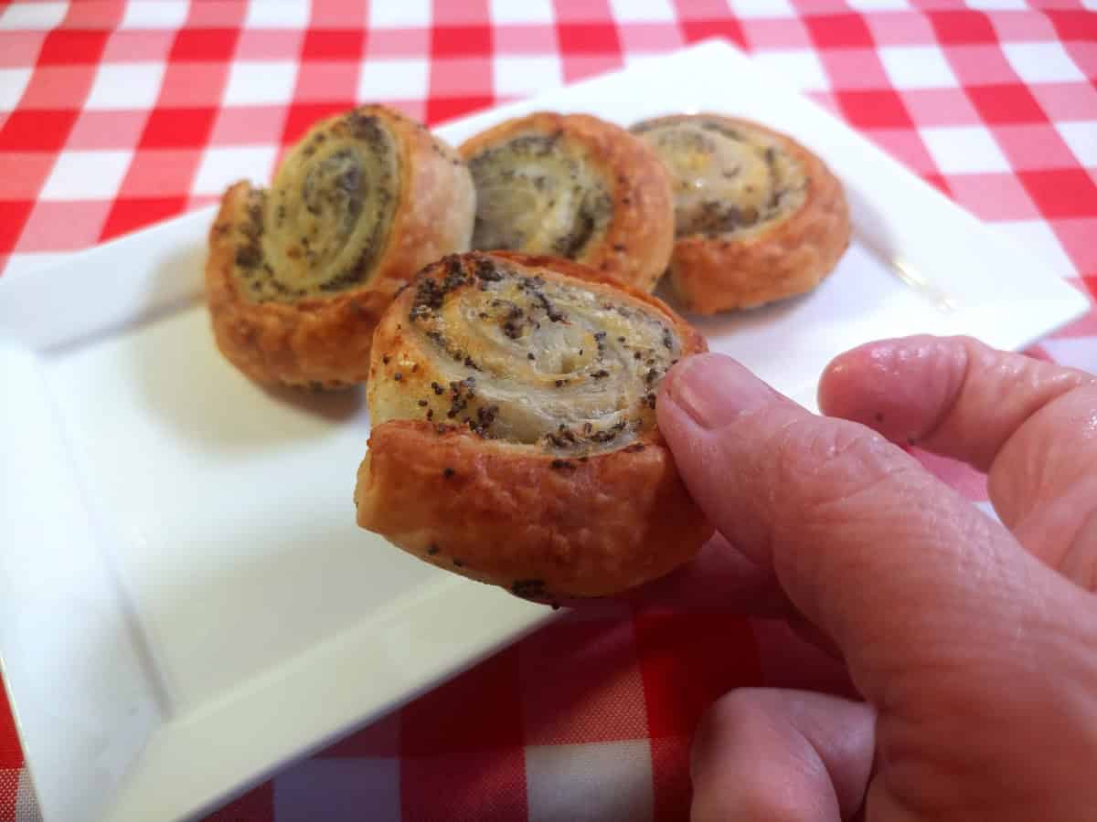 vegan savory puff pastry snails with poppy-parmesan and pizza